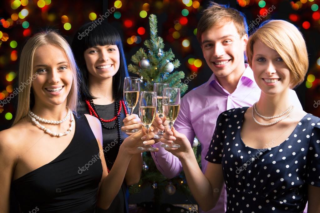 Friends celebrating New Year — Stock Photo © chagin #44794495