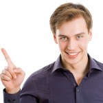 Casual businessman pointing Stock Photo by ©Ariwasabi 21568765