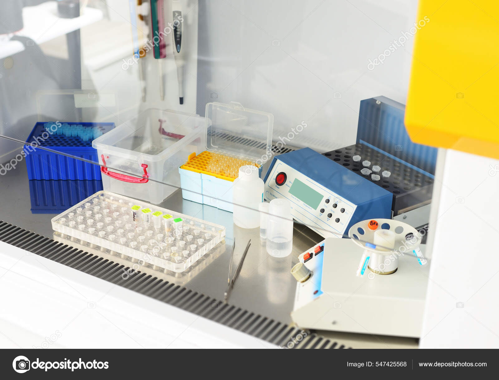Workplace of a medical worker in a PCR laboratory - dispensers ...