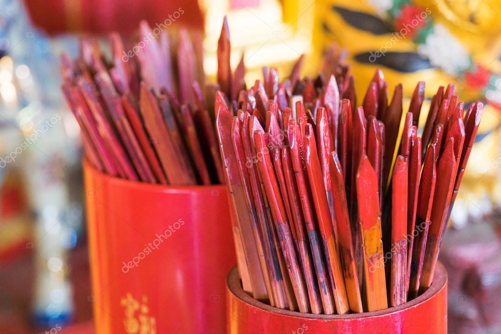 Red bamboo stick for shaking, ancient chinese fortune telling ca ...
