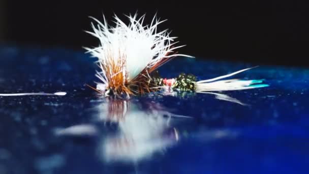 Fly fishing dry flies floating on water — Stock Video © Deibler #48485027