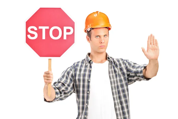 Boy holding stop sign — Stock Photo © kelpfish #7454041