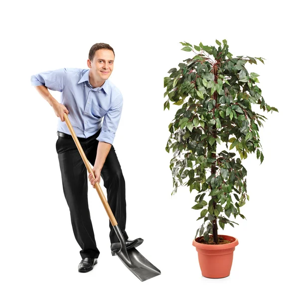 Man holding shovel Stock Photo by ©ljsphotography 45867275