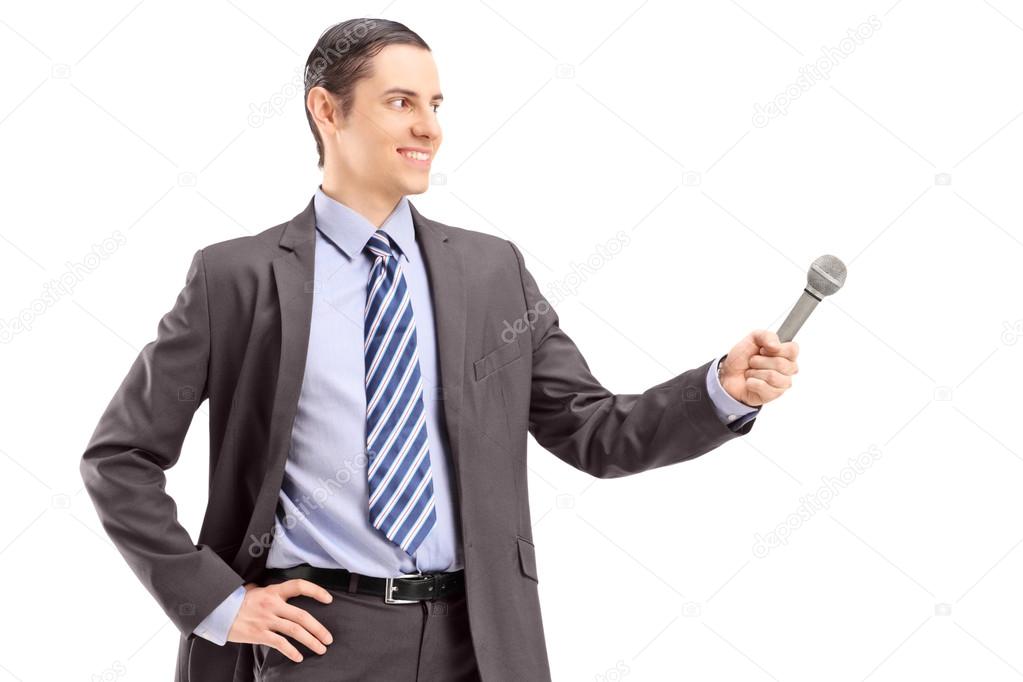 Reporter holding microphone — Stock Photo © ljsphotography #45866929