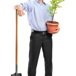 Man holding shovel Stock Photo by ©ljsphotography 45867275