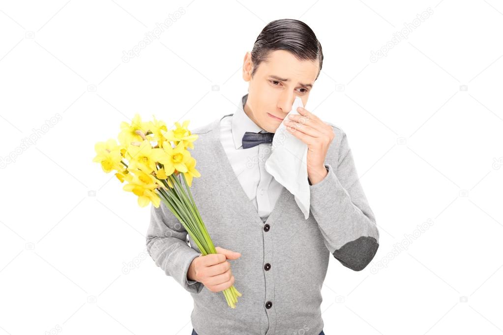 Sad man holding flowers and crying — Stock Photo © ljsphotography #45883483
