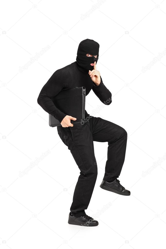 Man in robbery mask Stock Photo by ©ljsphotography 45884507