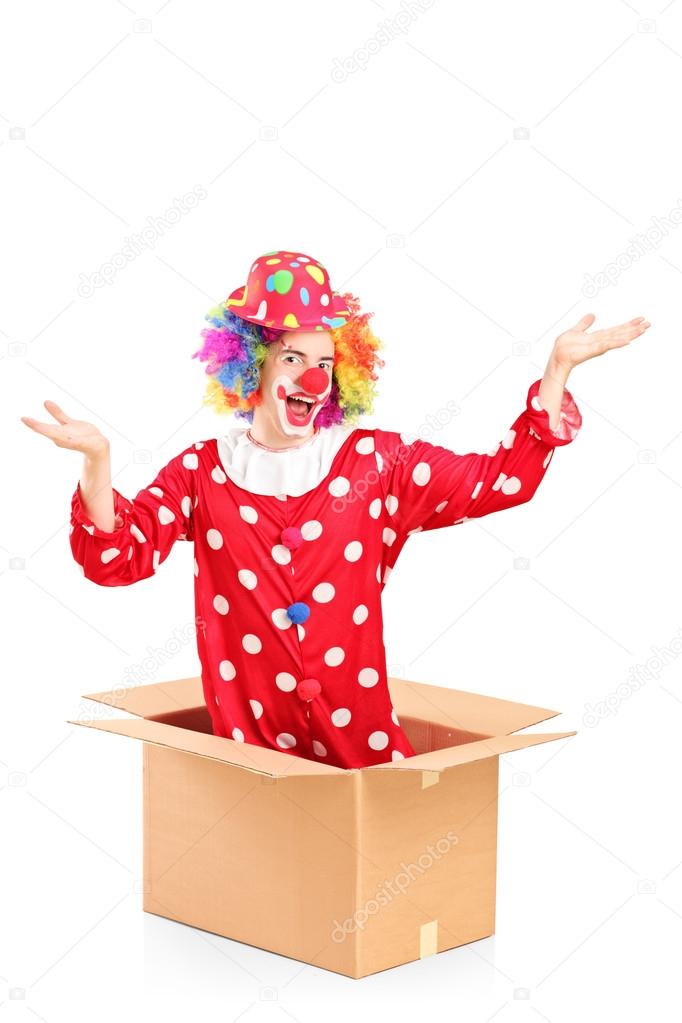 Clown sortant de la boîte en carton image libre de droit par ljsphotography © #45887375