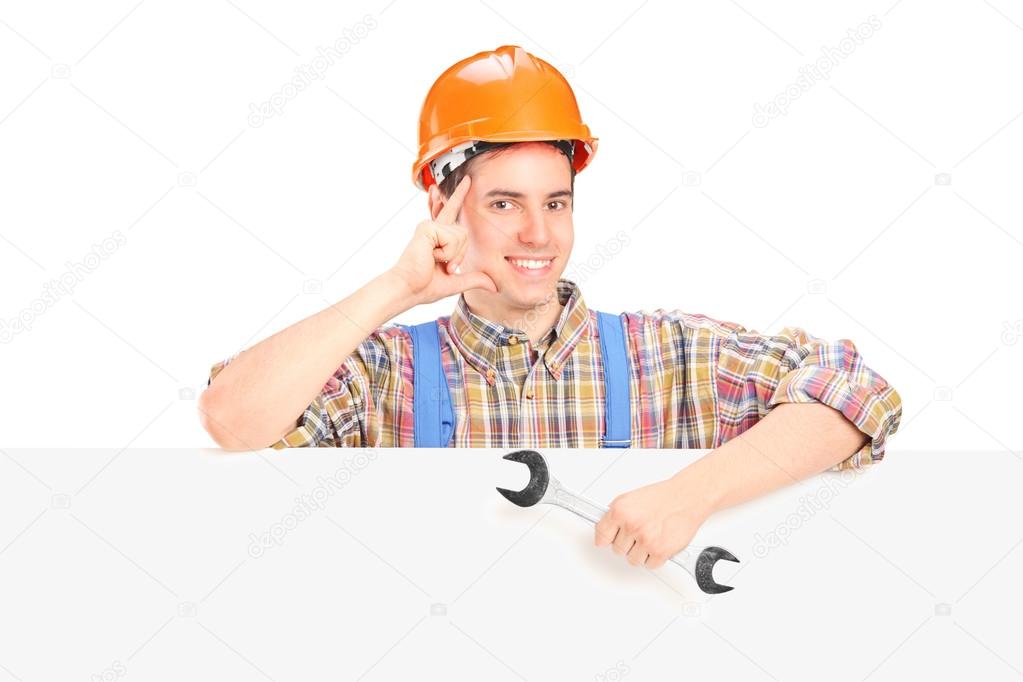Male construction worker behind panel Stock Photo by ©ljsphotography ...