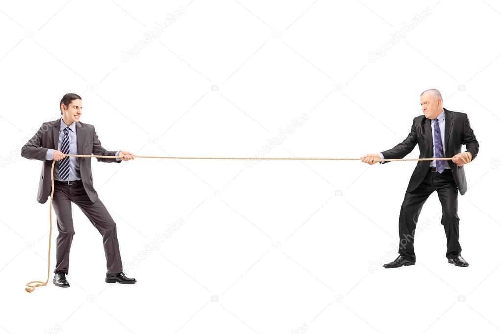 Two businessmen pulling rope Stock Photo by ©ljsphotography 45888199