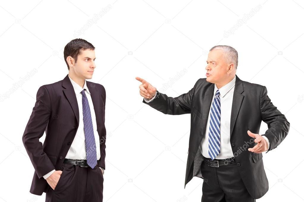 Man pointing towards young man — Stock Photo © ljsphotography #45888383
