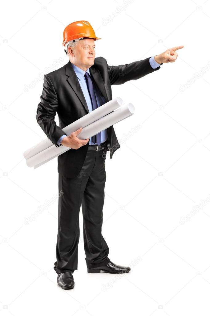Architect holding blueprint and pointing Stock Photo by ©ljsphotography ...