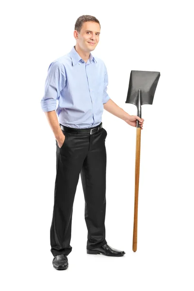 Man holding shovel Stock Photo by ©ljsphotography 45863555