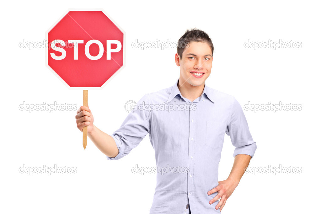 Man holding traffic sign stop — Stock Photo © ljsphotography #45890203