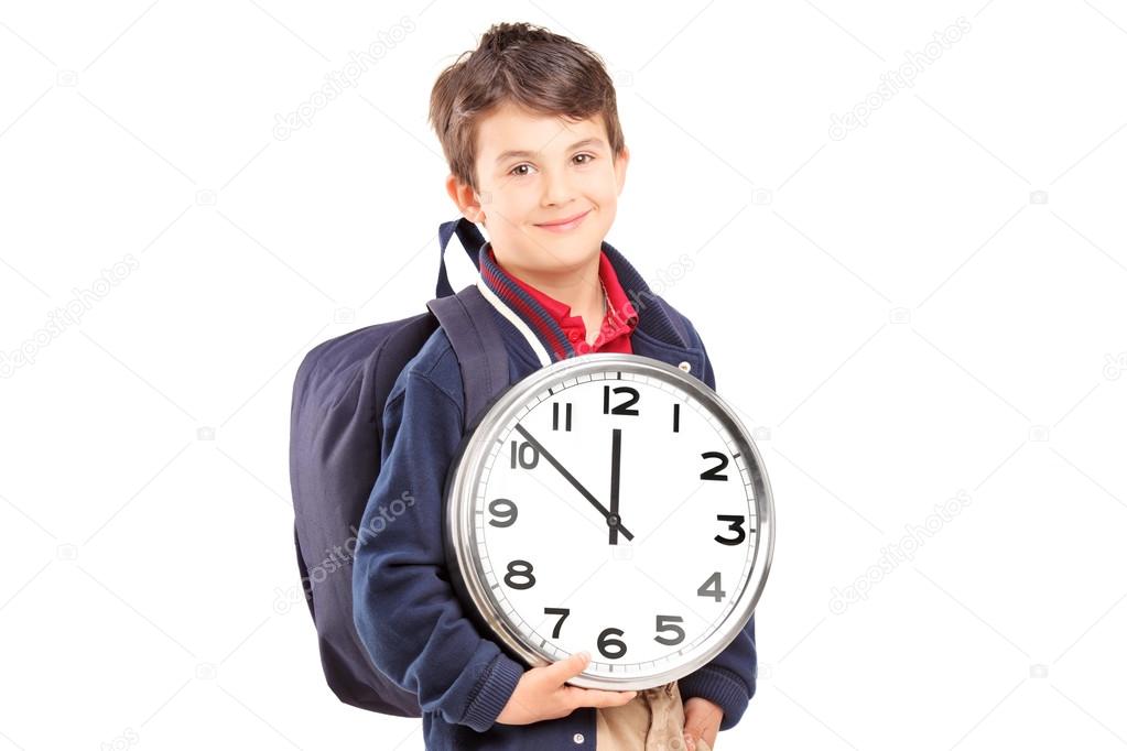 Schoolboy holding wall clock Stock Photo by ©ljsphotography 45890847