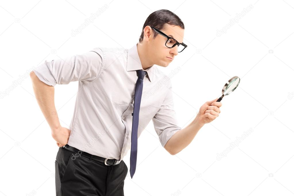 hombre mirando con lupa — Foto de stock © ljsphotography #49916393