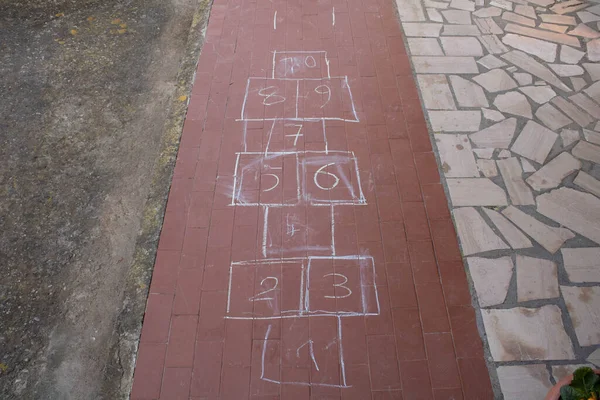 Kids playing hopscotch Stock Photos, Royalty Free Kids playing ...