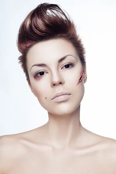 Girl with a cut on face Stock Photo by ©Kasimovafotoss 46104719