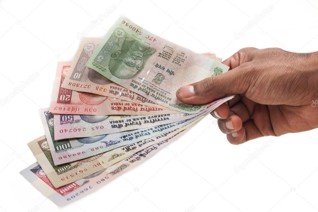 Cash in hand Stock Photo by ©nilanewsom 46525525
