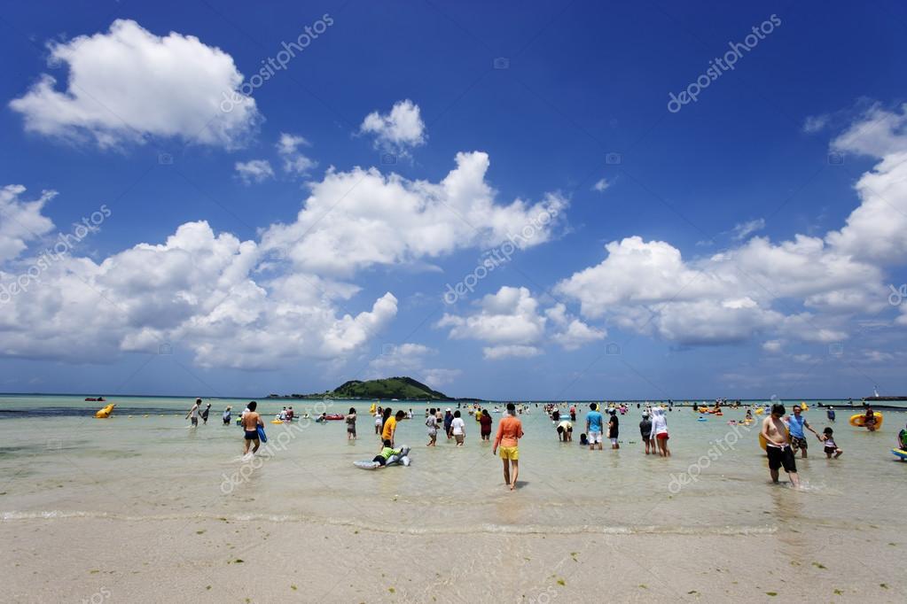 People rest and bathe at the beautiful Jeju Island in South Korea ...