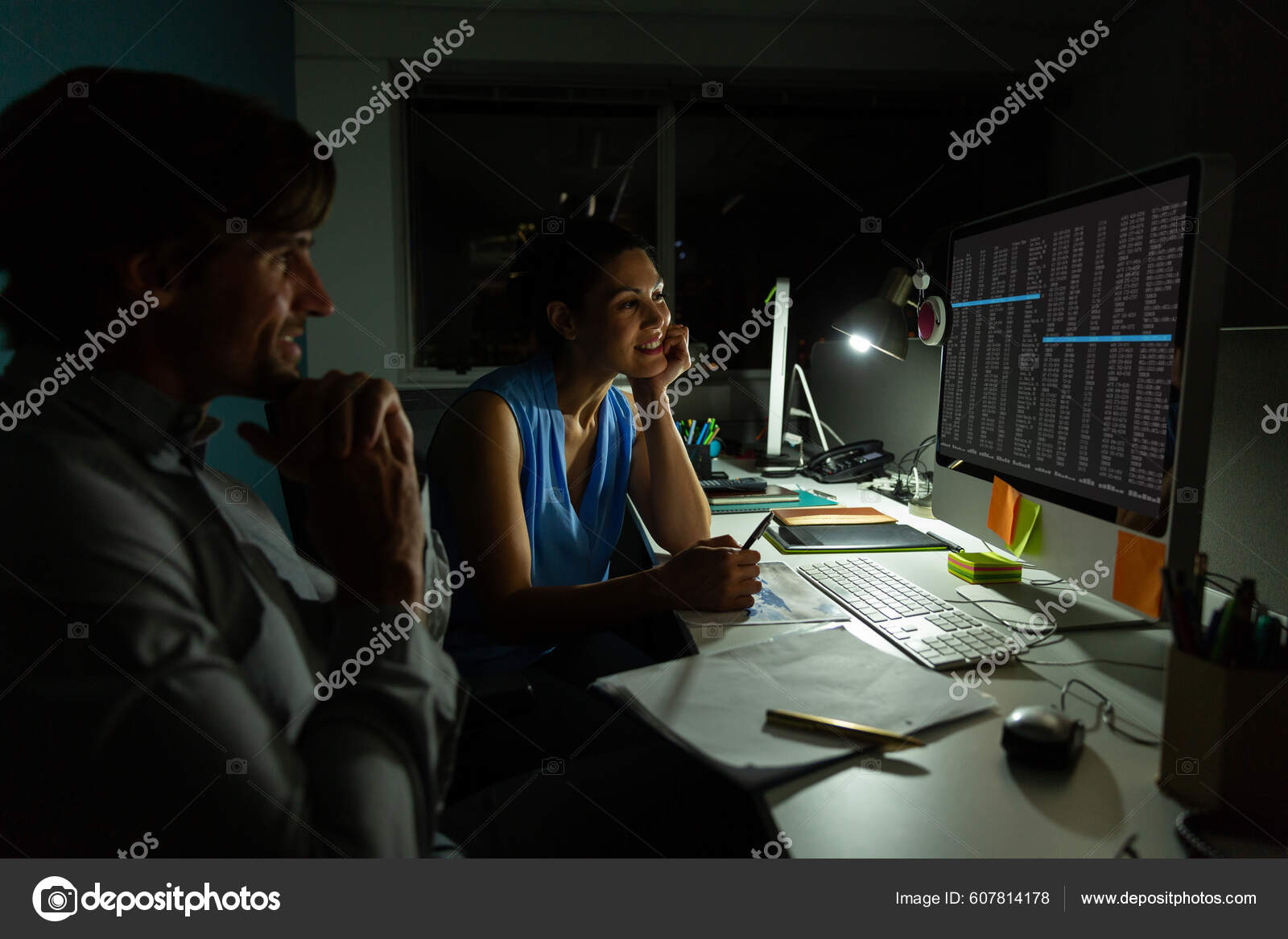 Two Diverse Male Female Colleagues Sitting Desk Using Computer Coding Stock Photo by ...