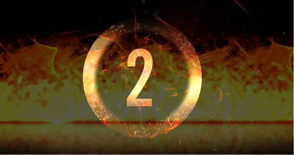 Image of ring and glowing number two in dramatic countdown over flaming ...