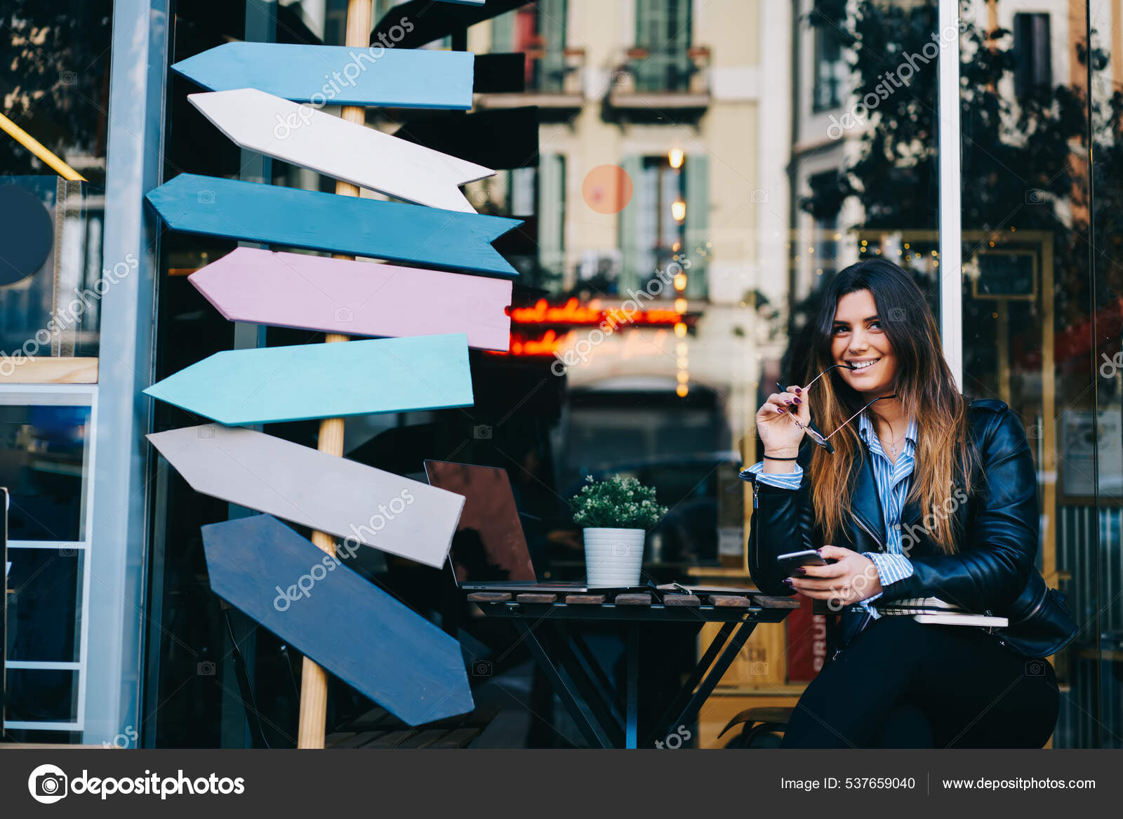 Smiling Female Freelancer Looking Away Sitting Table Street Signs ...