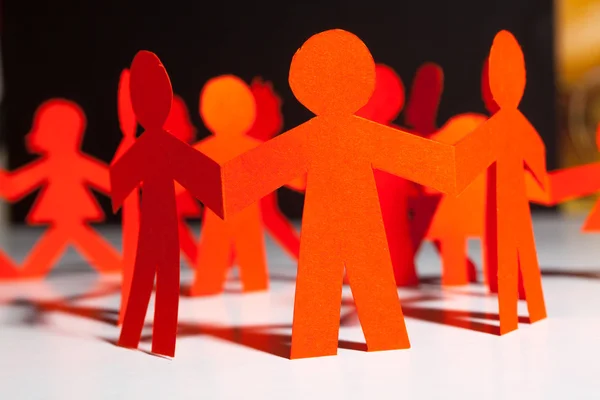 Paper team linked together partnership concept - Stock Image - Everypixel
