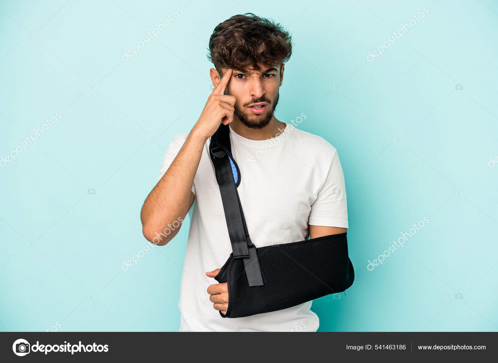 Young Arab Man Broken Hand Isolated Blue Background Showing ...