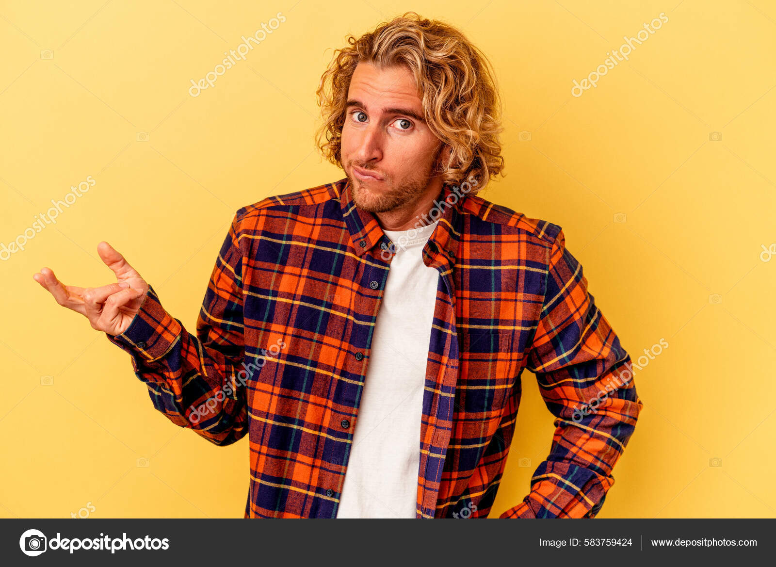Young Caucasian Man Isolated Yellow Background Doubting Shrugging ...