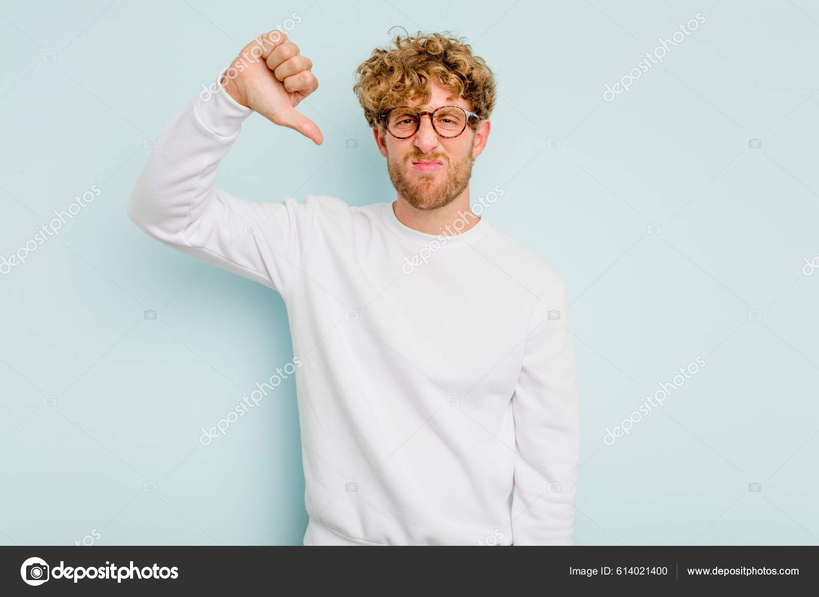Young Caucasian Man Isolated Blue Background Showing Thumb Expressing ...