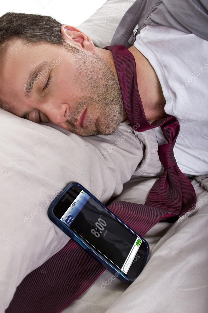Tardy employee unable to wake up in time to get to work Stock Photo by ...