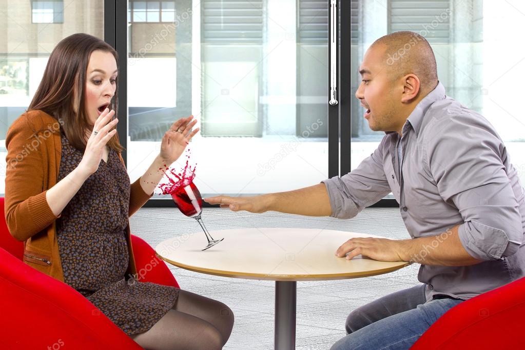 Man spilling drink on girlfriend Stock Photo by ©innovatedcaptures 49319001