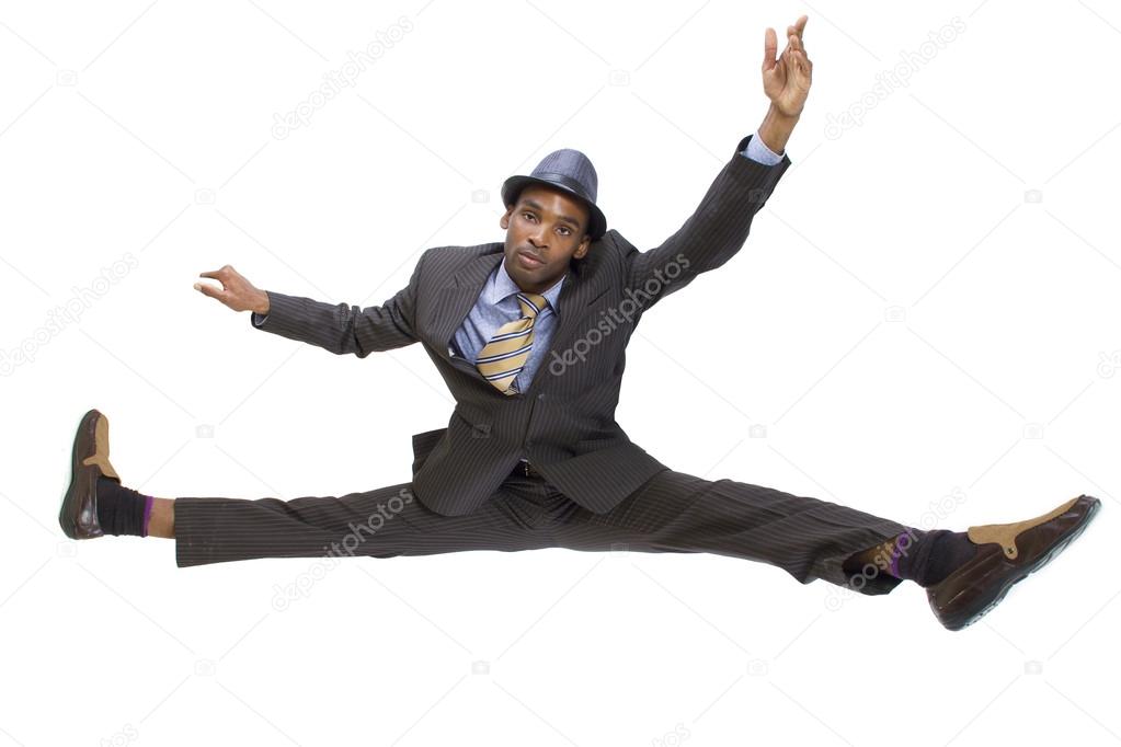 Man in suit doing splits — Stock Photo © innovatedcaptures #49319003