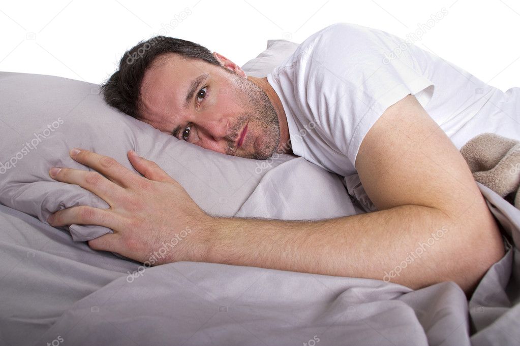 Man suffering from insomnia in bed — Stock Photo © innovatedcaptures ...