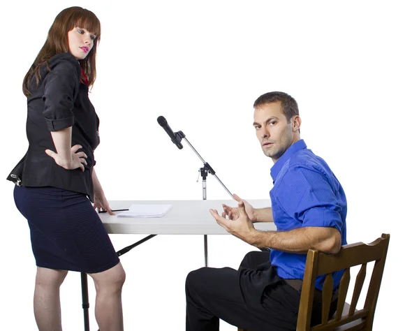 Female lawyer representing male client in a court hearing Stock Photo ...
