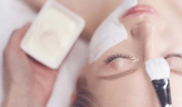 Spa facial mask application. Spa beauty organic facial mask application ...