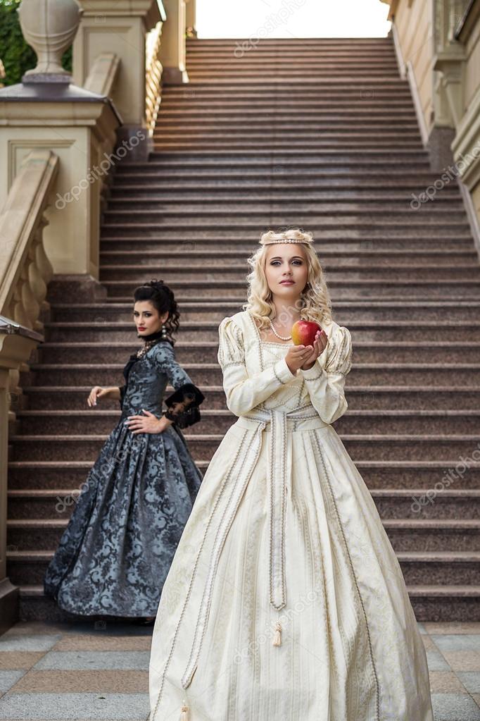 Two beautiful woman in vintage dress on nature — Stock Photo ...