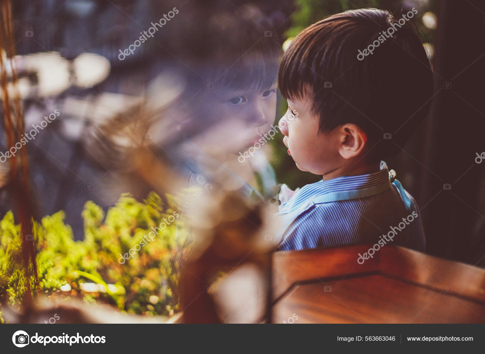 Bored Child Looking Out Window