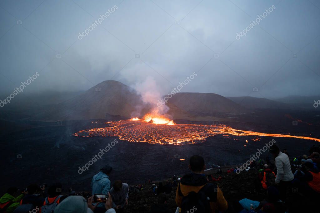 Hikers watching the Meradalir Eruption of Fagradalsfjall Volcano in ...