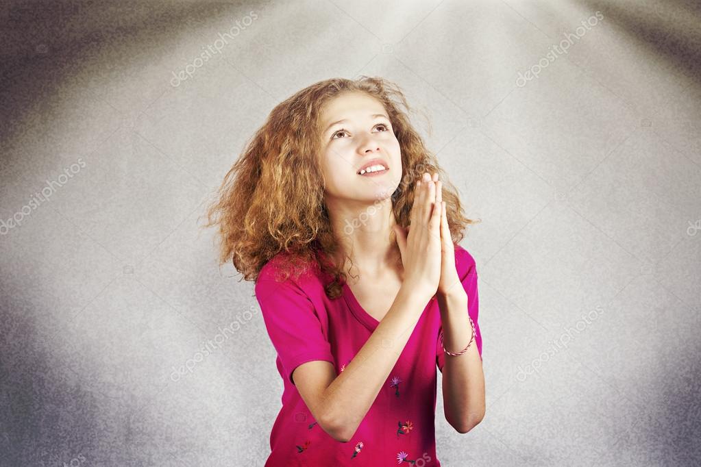 Young girl praying — Stock Photo © SIphotography #48952521