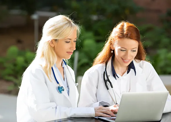 Happy health care professionals, doctors, medical students worki ...