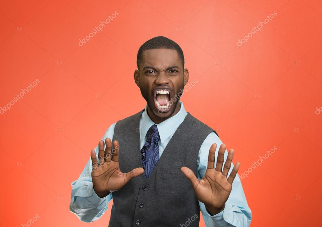 Angry executive gesturing with hands to stop Stock Photo by ...