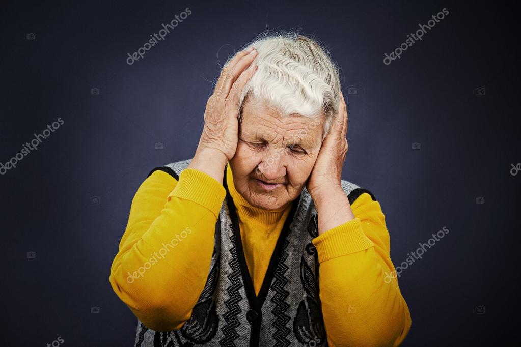 Stressed depressed elderly woman Stock Photo by ©SIphotography 50361553