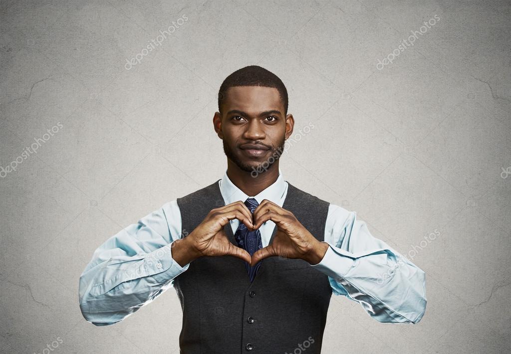 Happy man makes heart using fingers Stock Photo by ©SIphotography 51264117