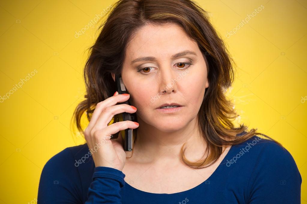 Sad stressed hopeless woman talking on a mobile phone Stock Photo by ...