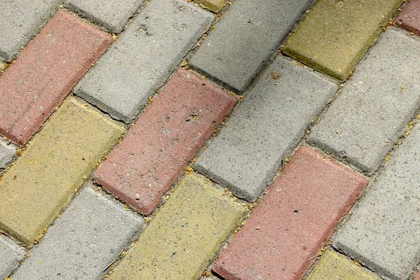 Texture of colored concrete pavement on the sidewalk - Stock Image ...