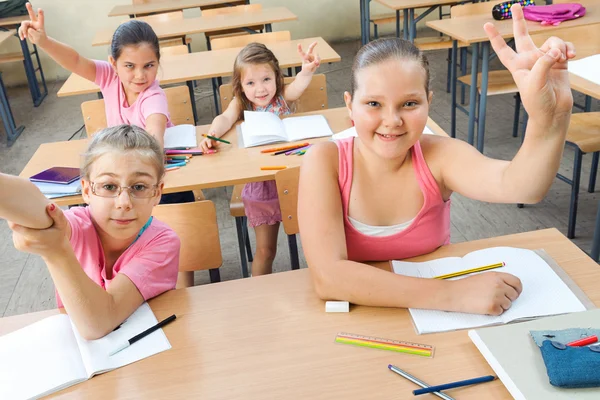 Elementary School Students at Classroom Desks - Stock Image - Everypixel