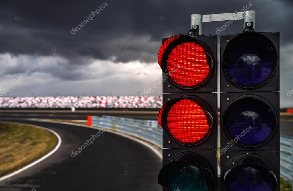 Traffic light on race track Stock Photo by ©sorokopud 49590897