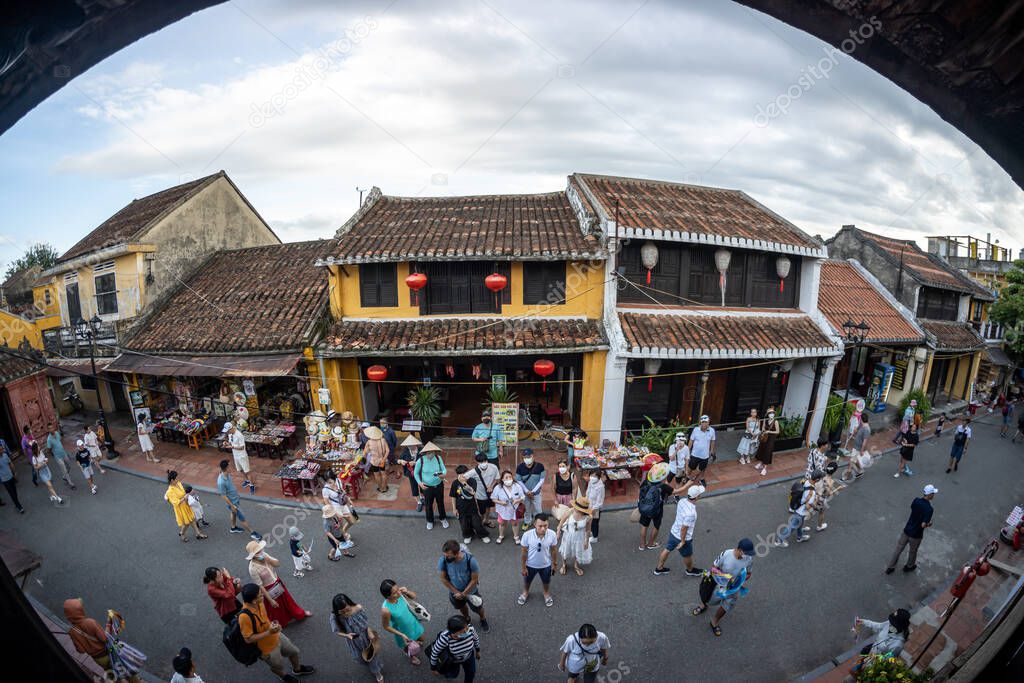 Main street in Hoi An Ancient Town bustling with tourists. Taken in Hoi ...